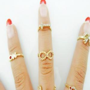 Zircon Cross Bow Ring ( Seven Sets ) on Luulla